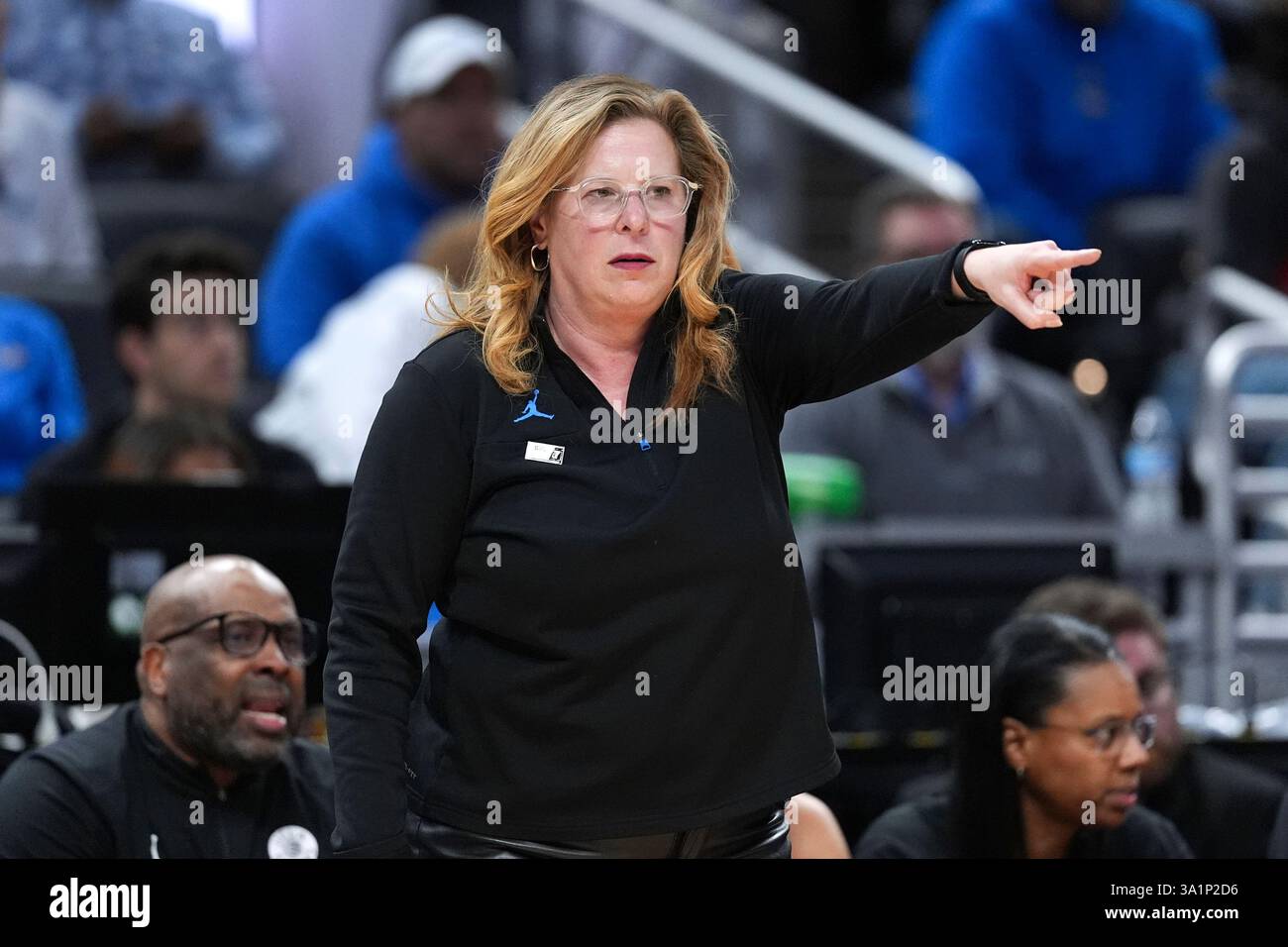 UCLA head coach Cori Close watches against Southern California during ...