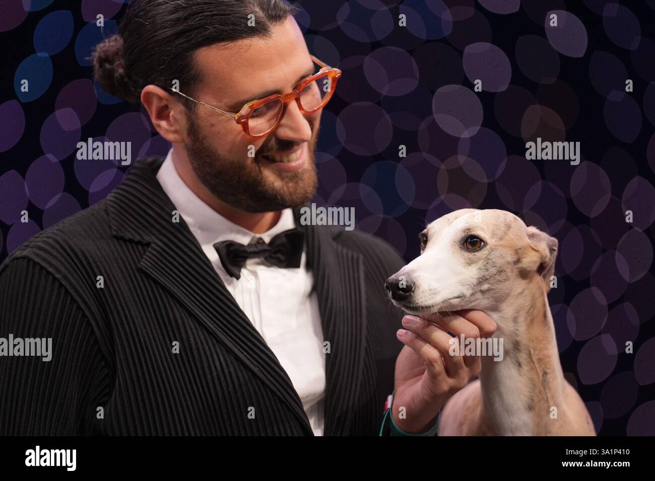 Giovanni Liguori from Italy with whippet Miuccia, winner of the Best in Show final at the Crufts ...