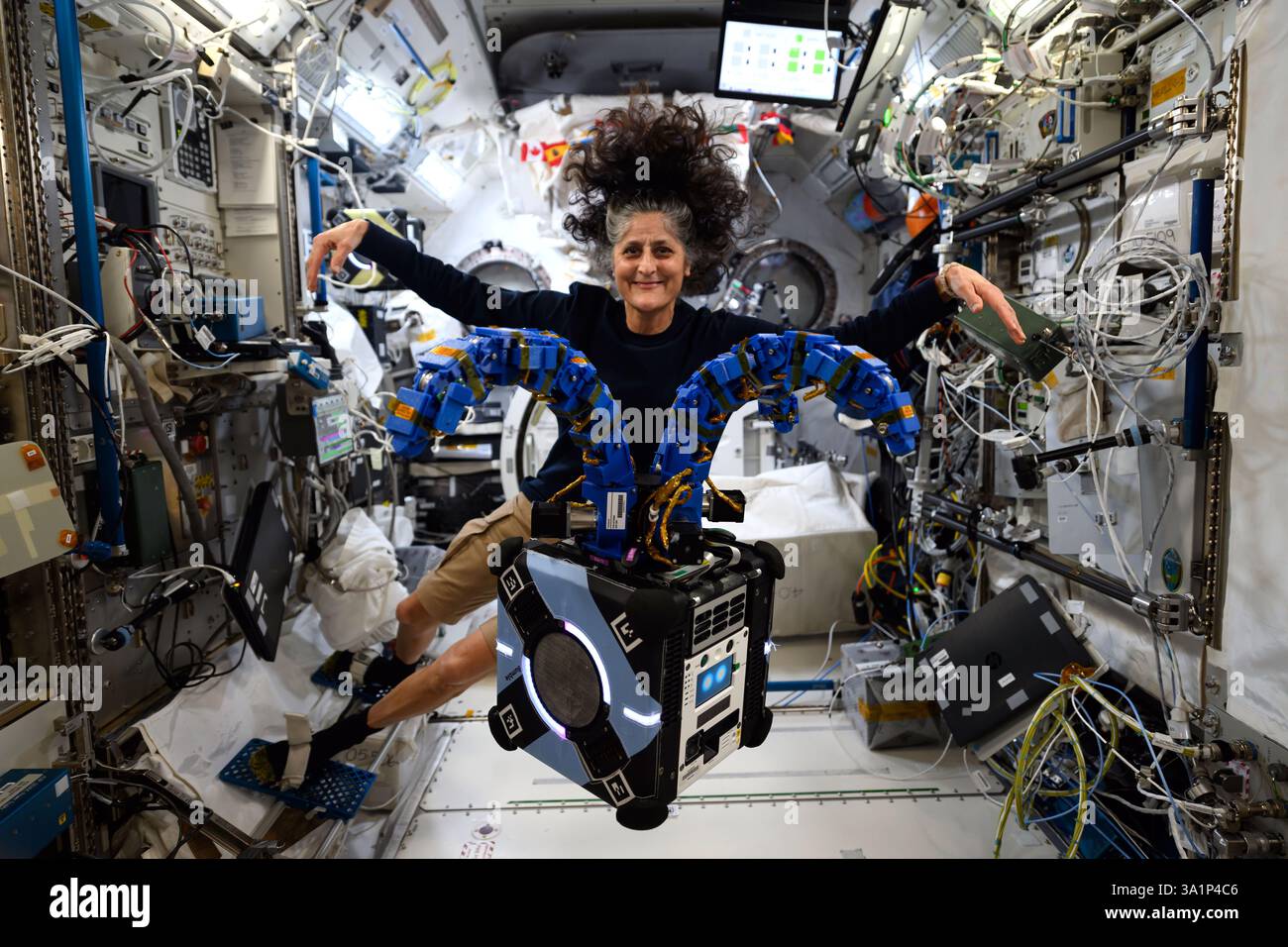 NASA astronaut and Expedition 72 Commander Suni Williams checks out the ...