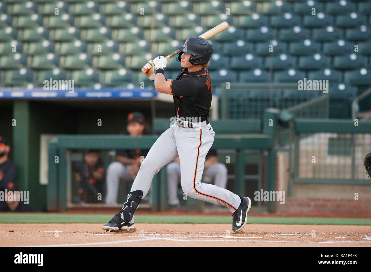Walker Martin (7) of the ACL Giants follows through on a swing during ...