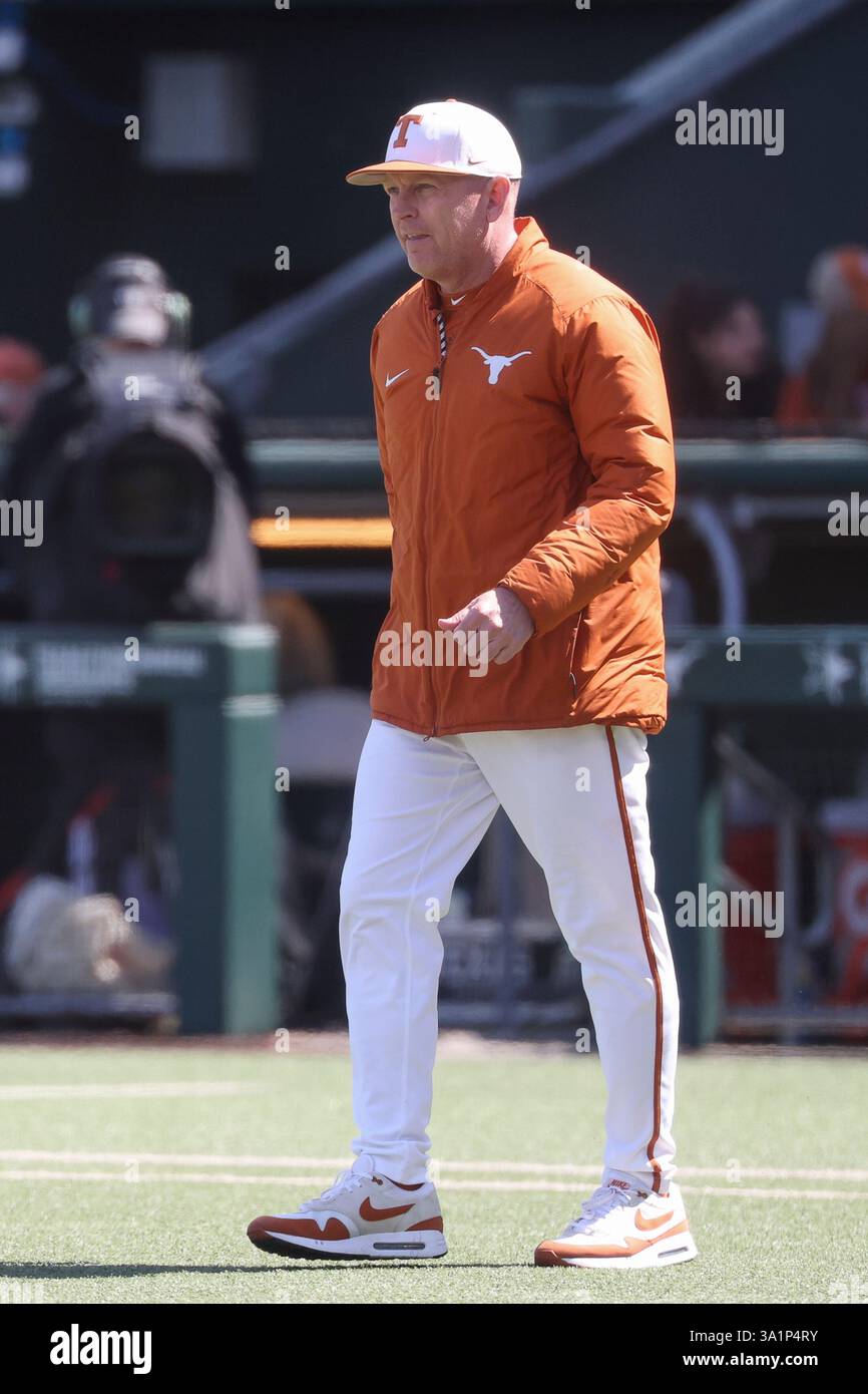 AUSTIN, TX - MARCH 09: Texas head coach walks out to the mound during ...