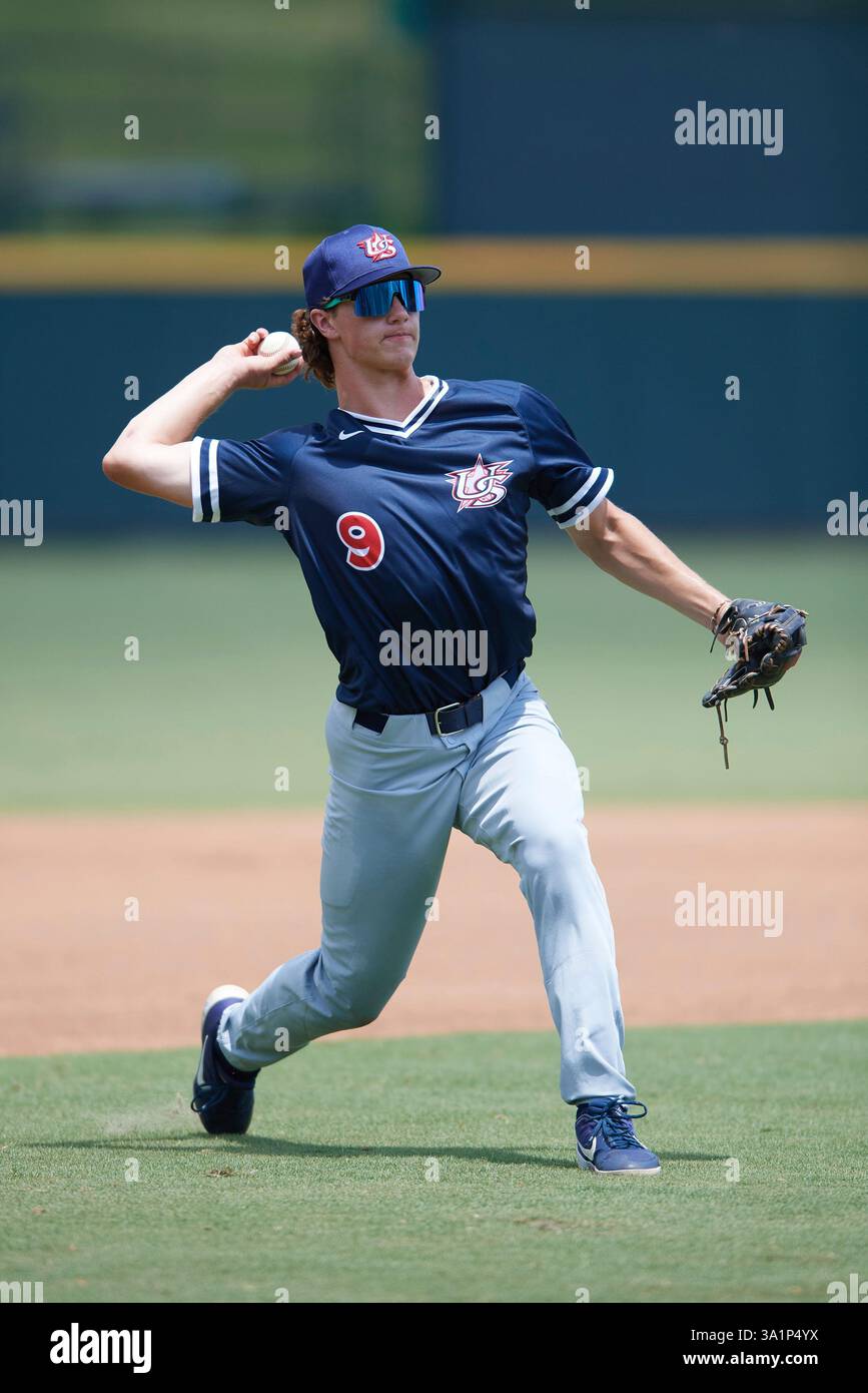 Xavier Neyens (9) (Mount Vernon, WA) throws to first base during the ...