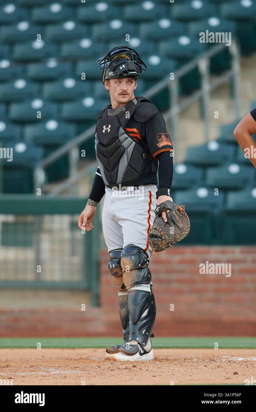 ACL Giants catcher Ty Hanchey (16) looks over toward the dugout during ...