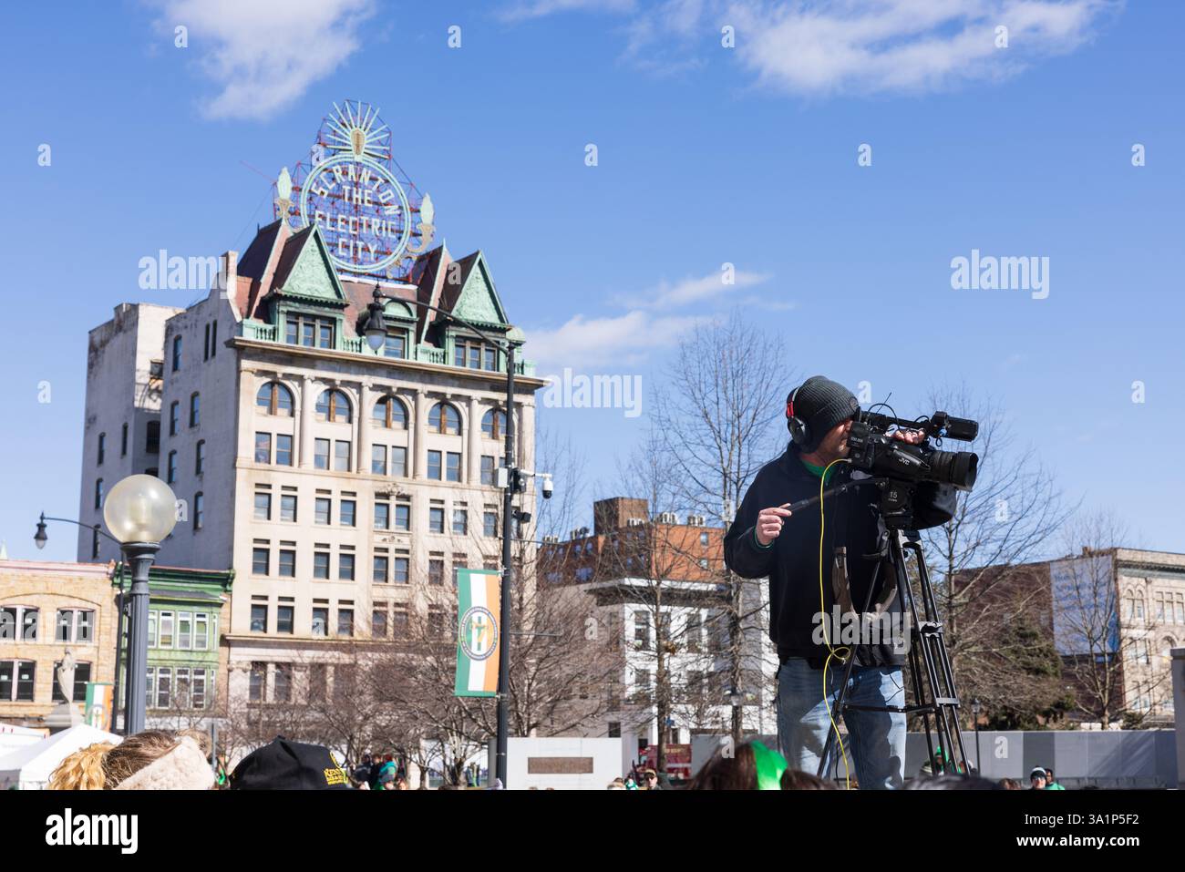 Scranton, PA - March 8, 2025 : St. Patrick's Parade day, a man is ...
