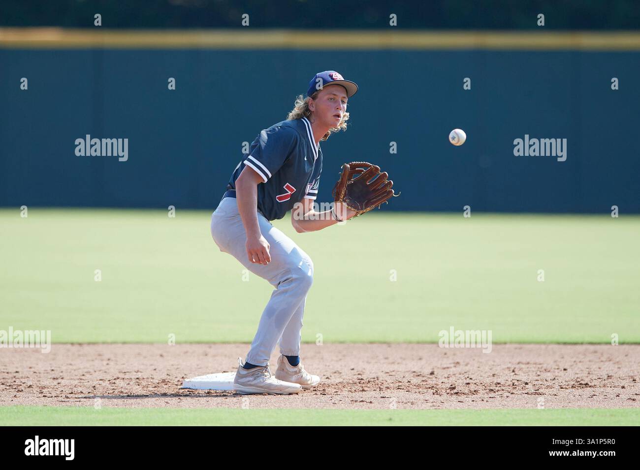 Ethan Holliday (7) (Stillwater, OK) awaits a throw to second base ...