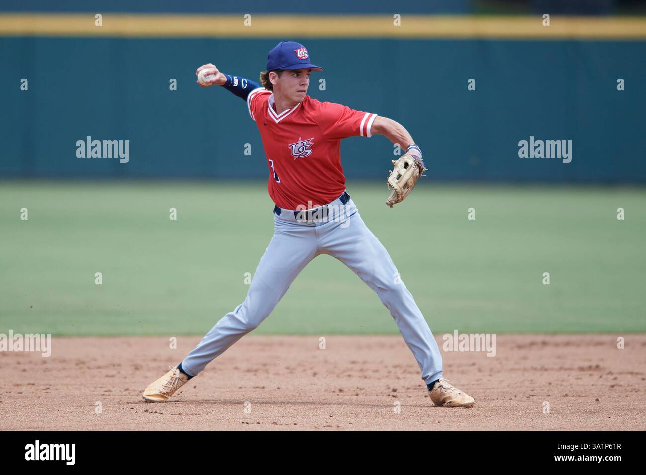 Steele Hall (1) (Trussville, AL) throws to first base during the USA ...