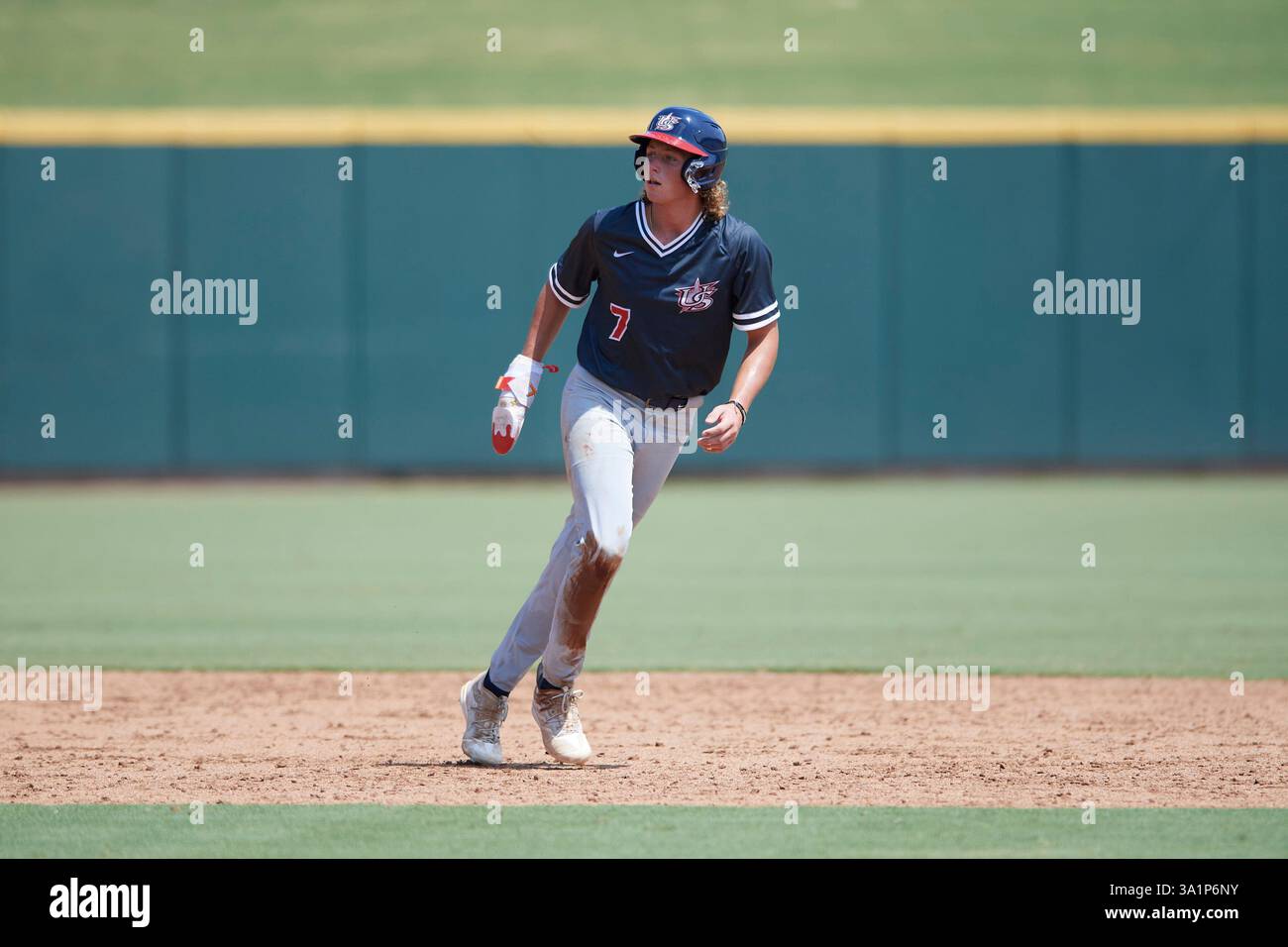 Ethan Holliday (7) (Stillwater, OK) leads off second base during the ...