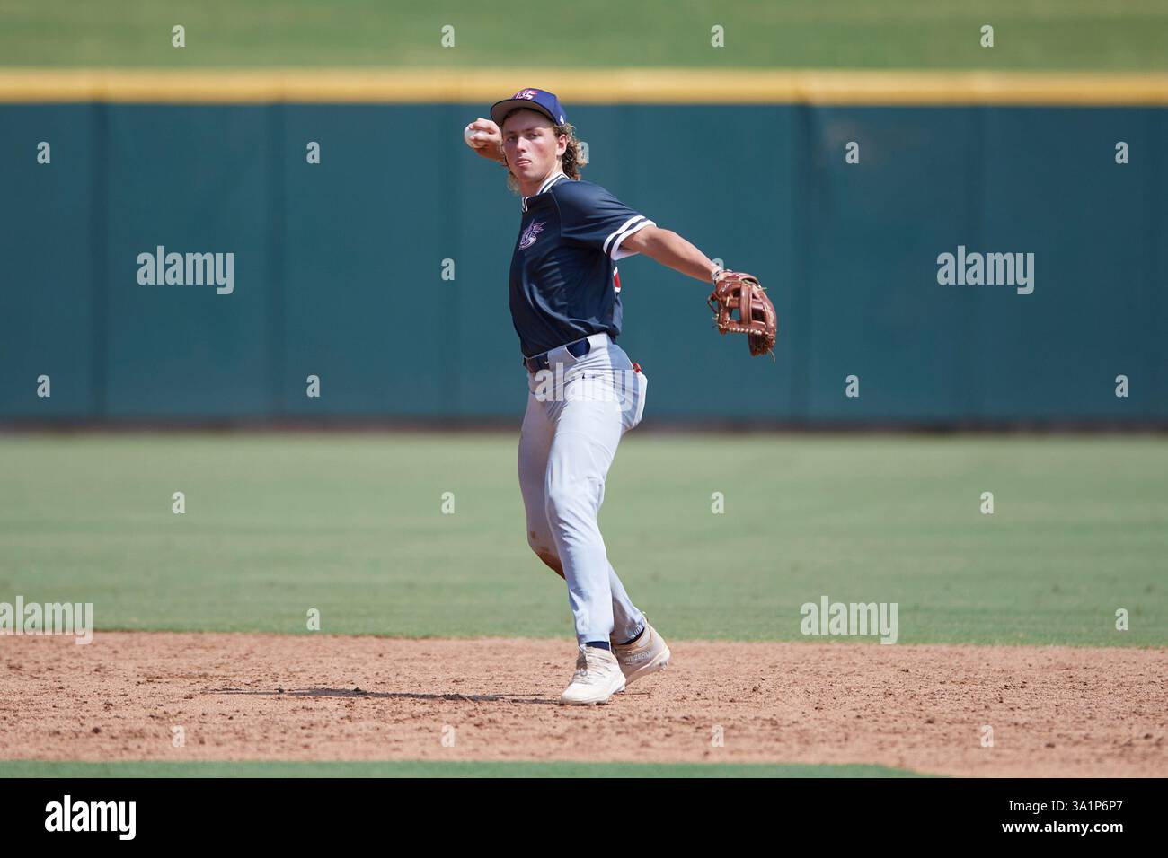 Ethan Holliday (7) (Stillwater, OK) throws to first base during the USA ...