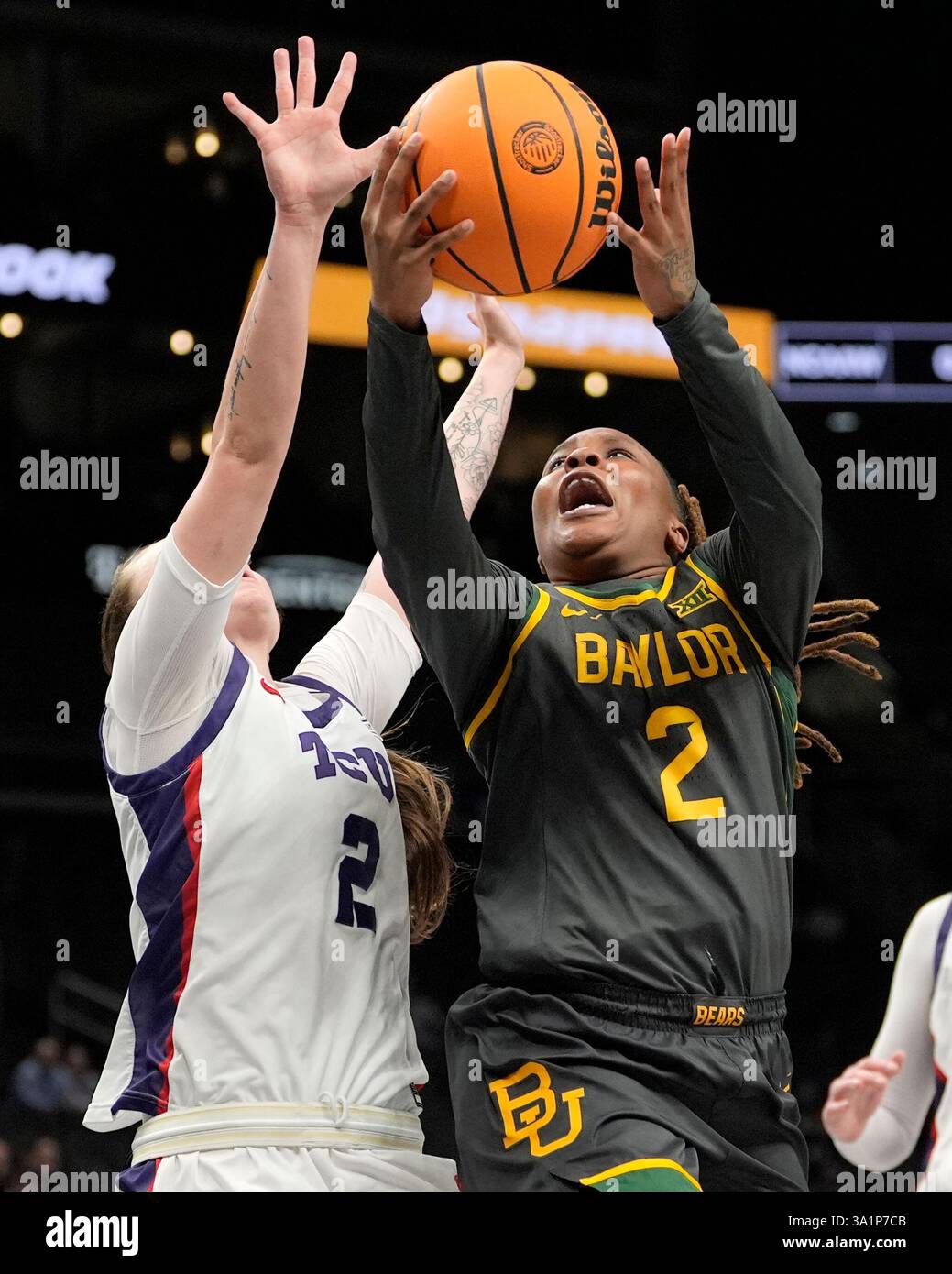 Baylor guard Yaya Felder, right, beats TCU guard Madison Conner to a ...