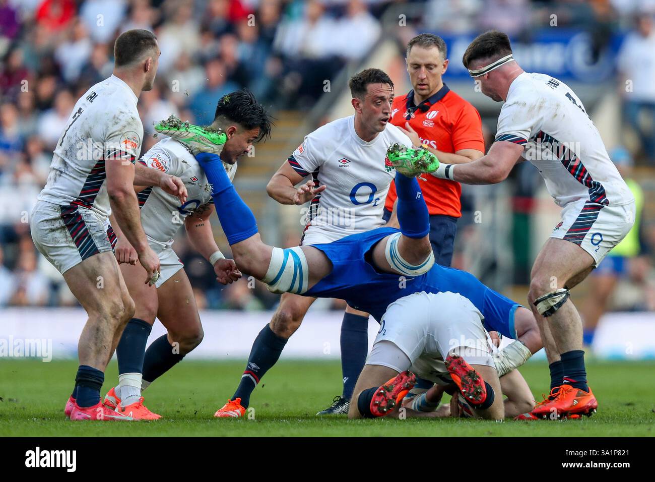 Simone Ferrari of Italy is tackled during the 2025 Guinness 6 Nations ...