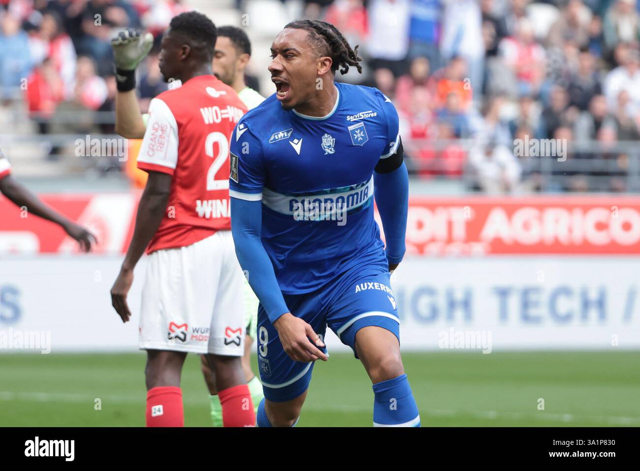Reims, France. 09th Mar, 2025. Thelonius Theo Bair of Auxerre ...