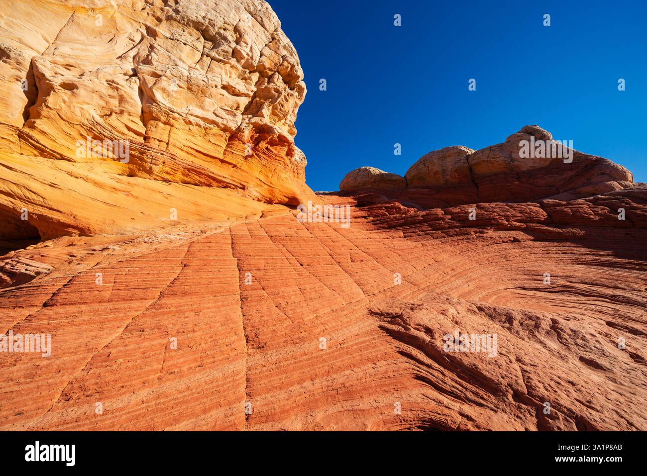 Rugged red rock layers reveal the stunning geology of White Pocket in ...