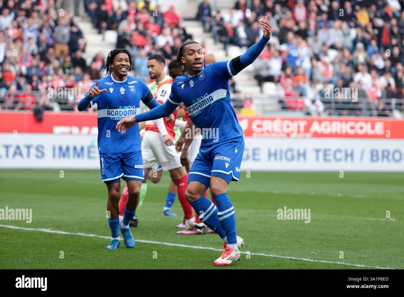 Thelonius Theo Bair of Auxerre celebrates his goal with Gabriel Osho ...