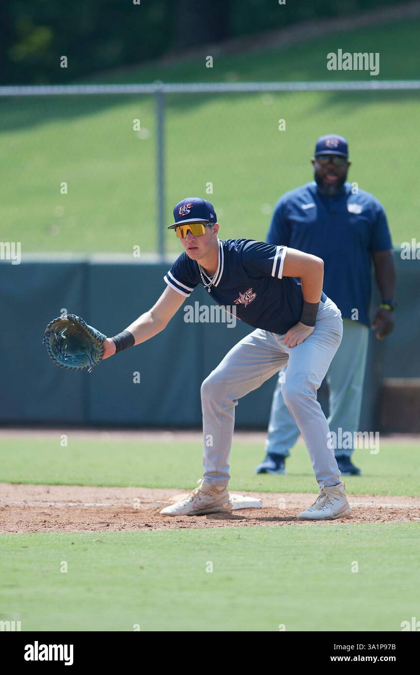 Charlie Buckles (13) (Bethesda, MD) awaits a throw from the pitcher ...