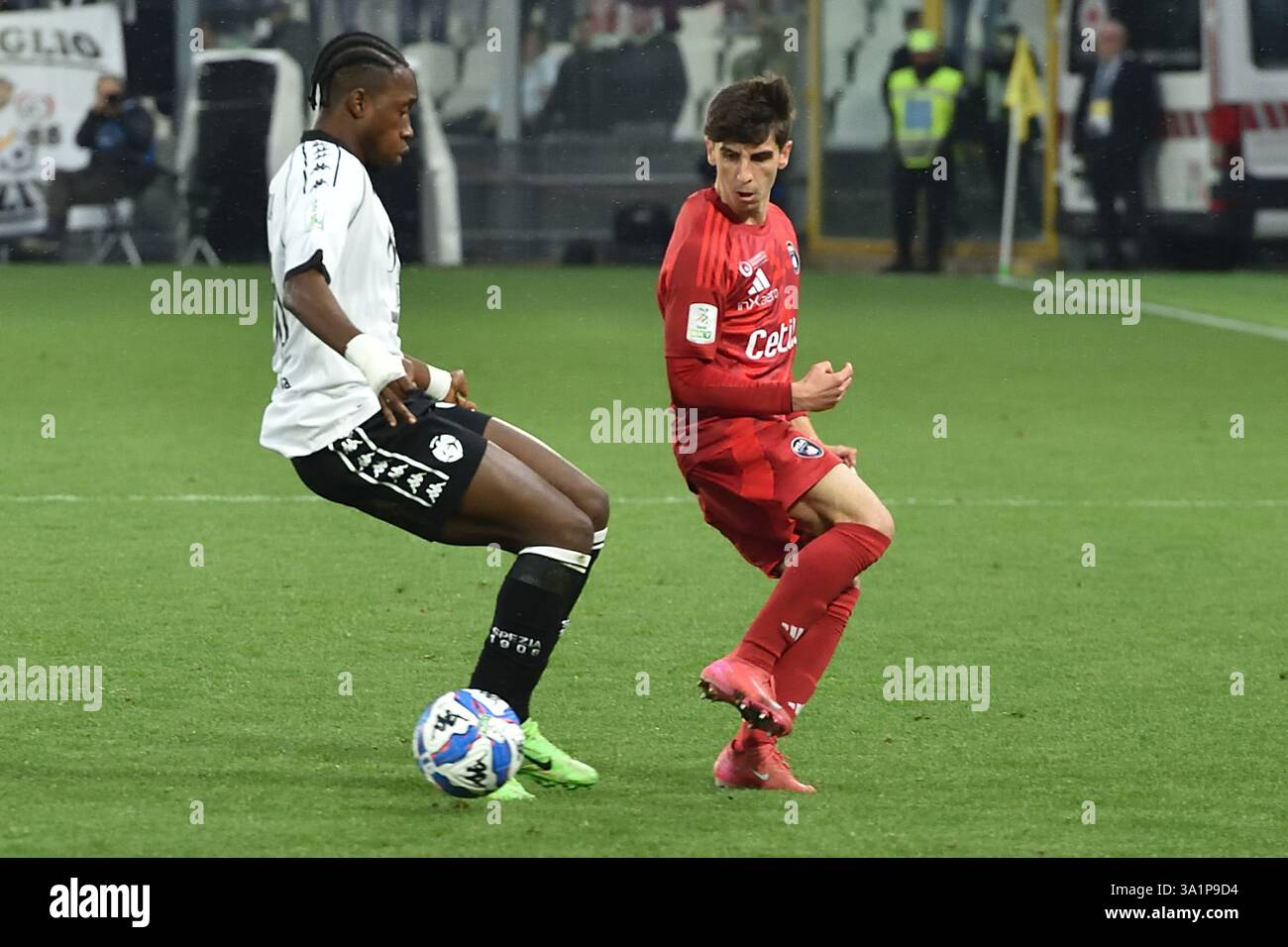 Alessandro Arena (Pisa) thwarted by Rachid Kouda (Spezia) during Spezia ...