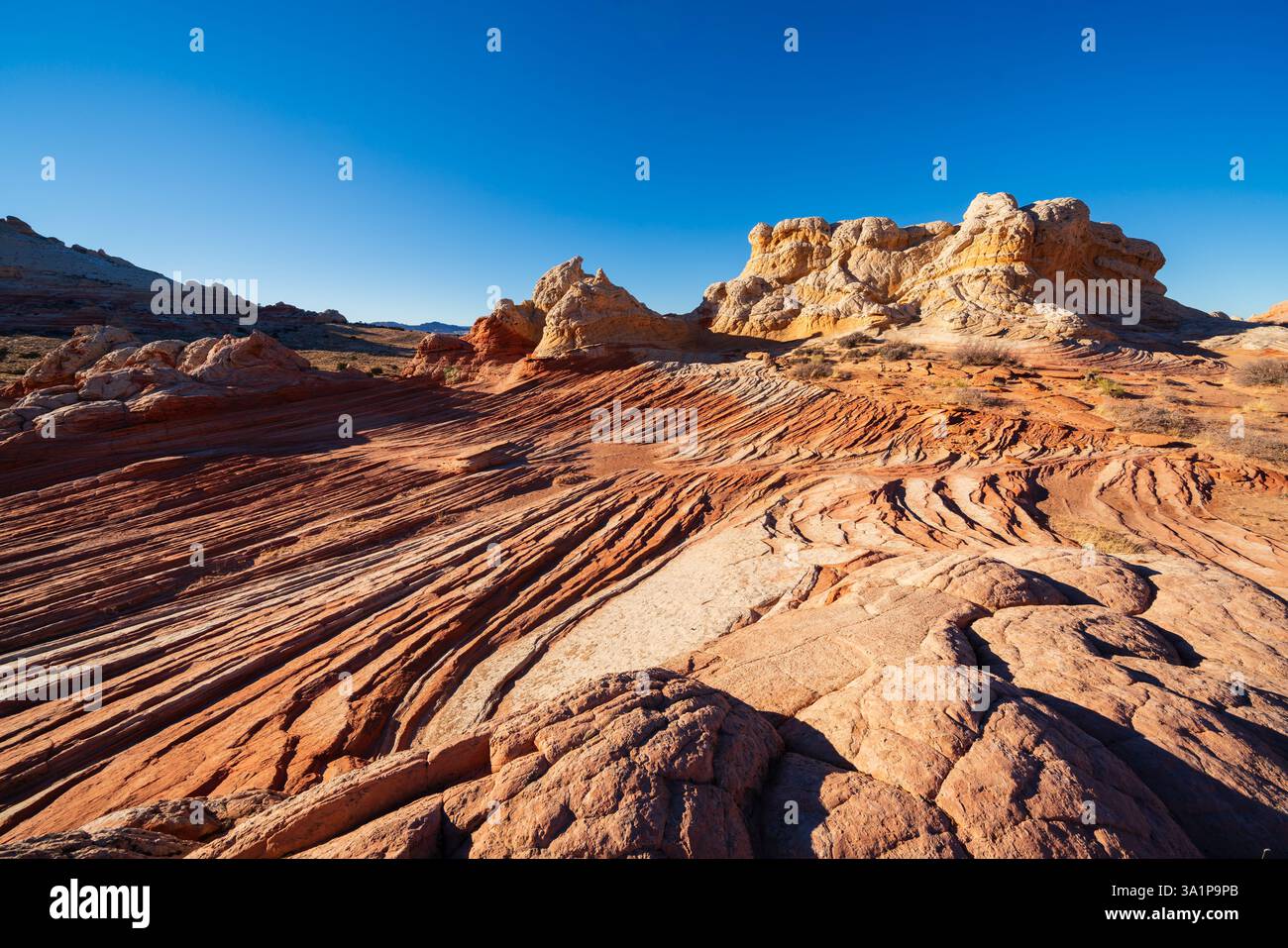 Colorful rock layers and unique geological features dominate the ...