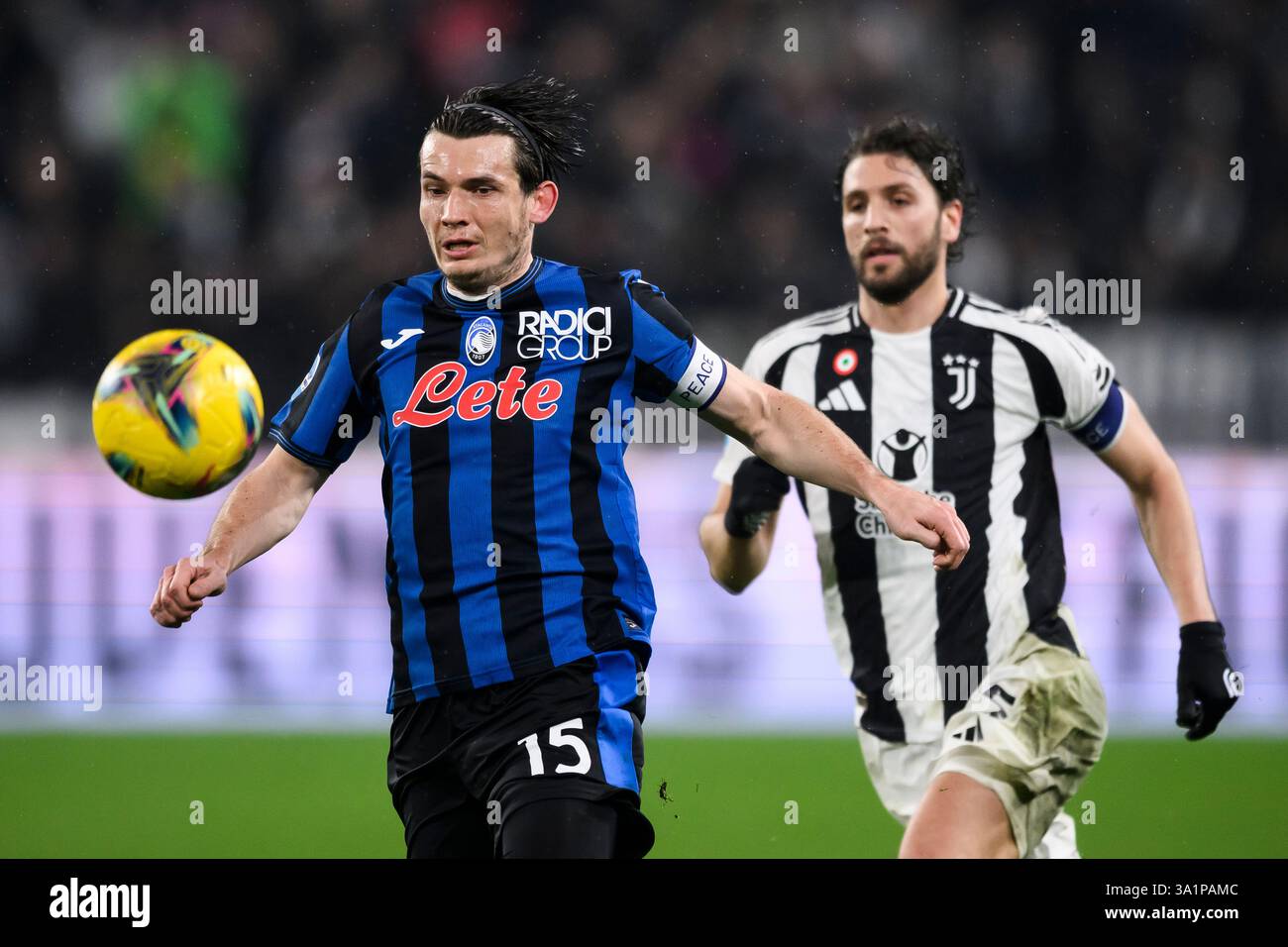 Turin, Italy. 9 March 2025. Marten de Roon of Atalanta BC competes for ...
