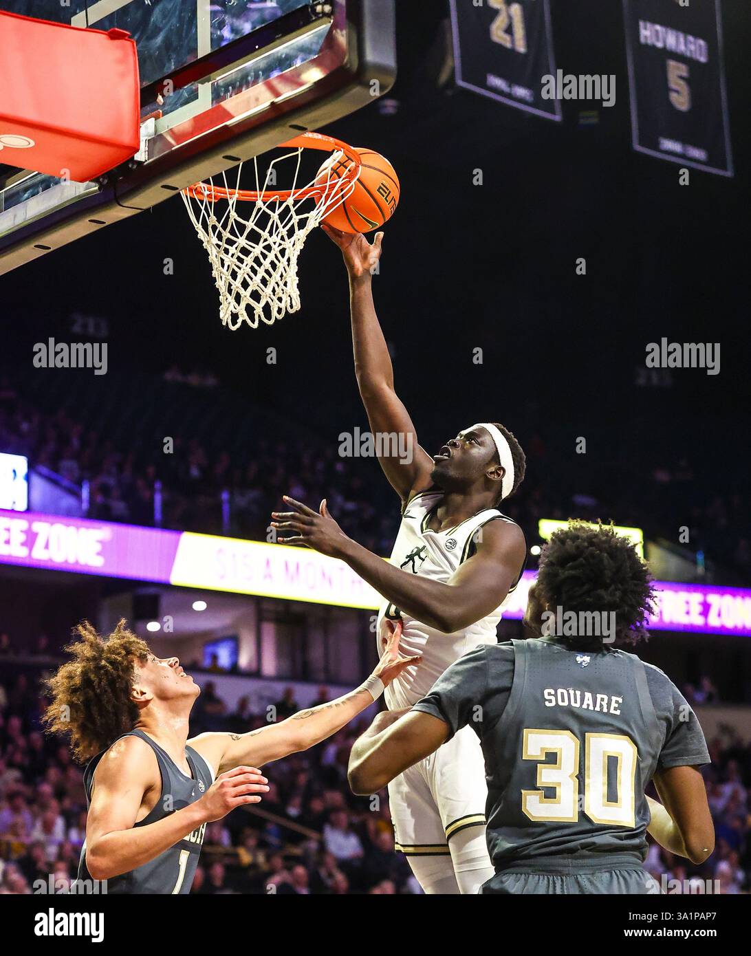 March 8, 2025: Wake Forest forward Omaha Biliew (0) shoots over Wake ...