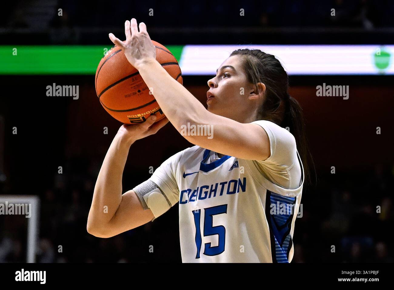 Creighton guard Lauren Jensen (15) shoots during the first half of an ...