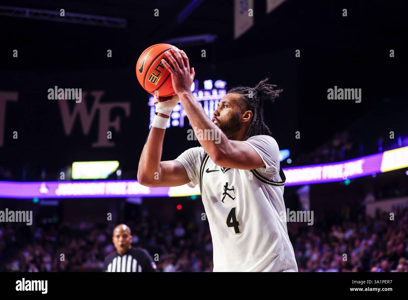 March 8, 2025: Wake Forest center Efton Reid III (4) lines up for 3 ...