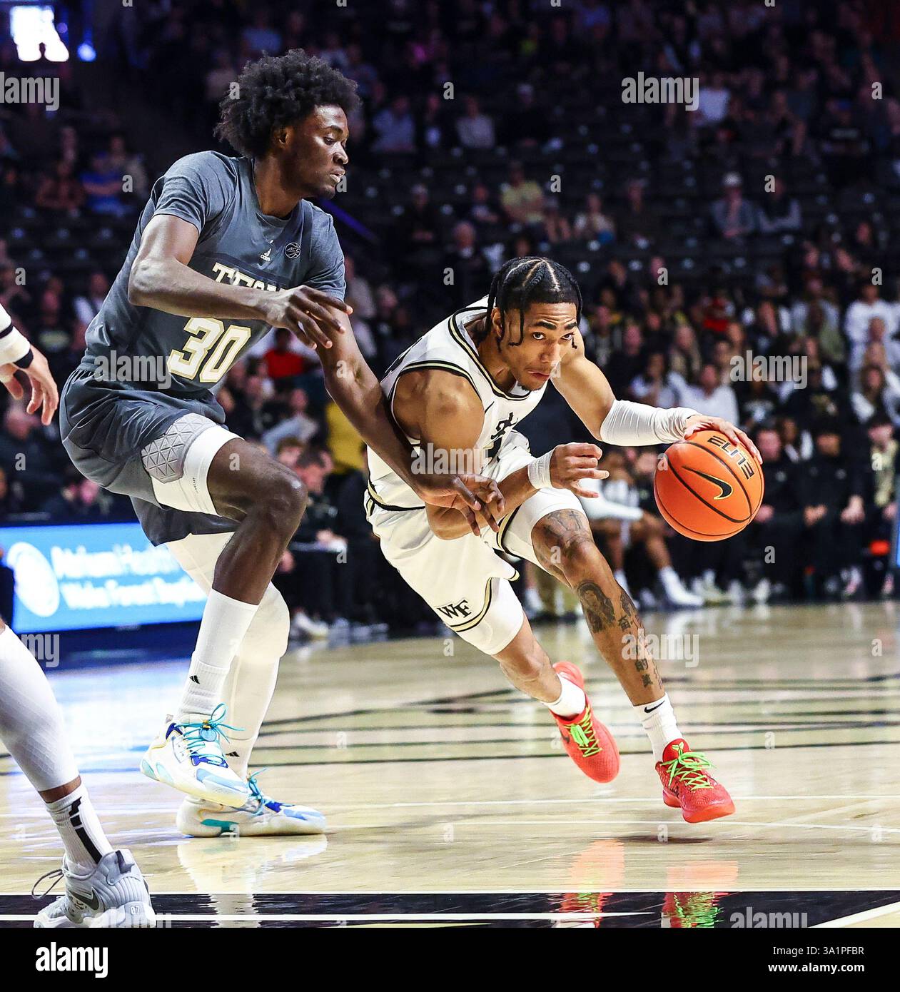 March 8, 2025: Wake Forest guard Hunter Sallis (23) drives to the ...