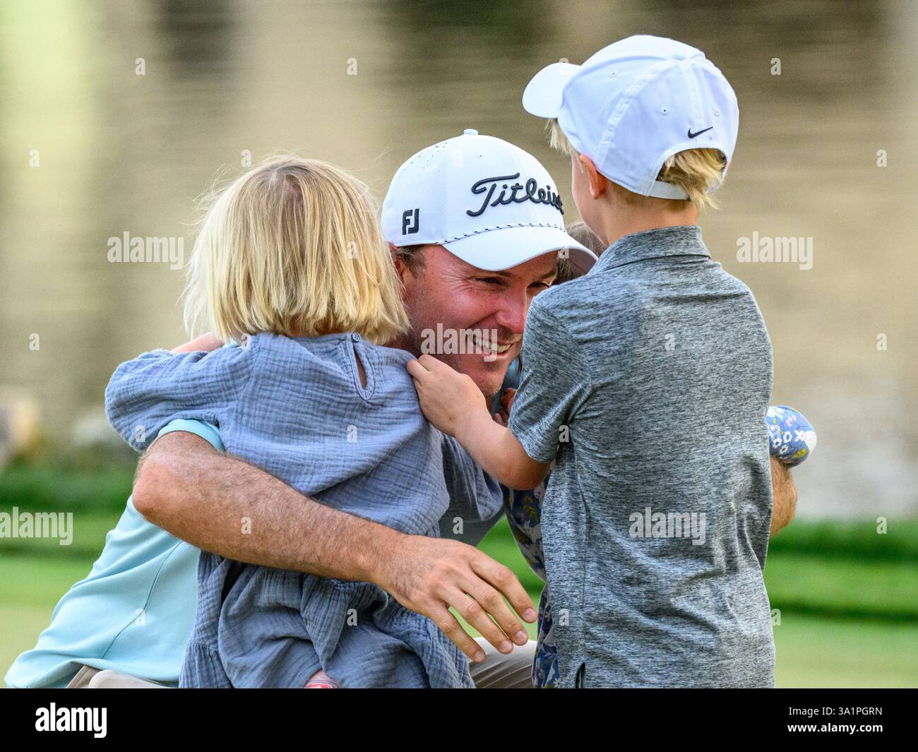 Orlando, FL, USA. 9th Mar, 2025. Russell Henley is greeted by his ...