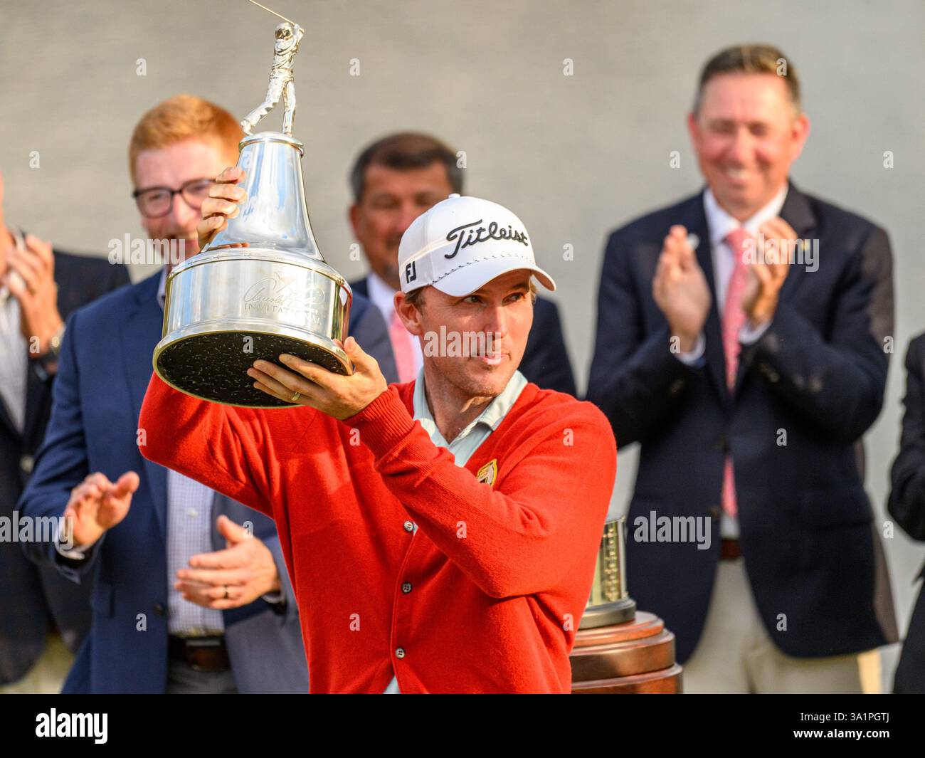 Orlando, FL, USA. 9th Mar, 2025. Russell Henley hoist the Arnold Palmer ...