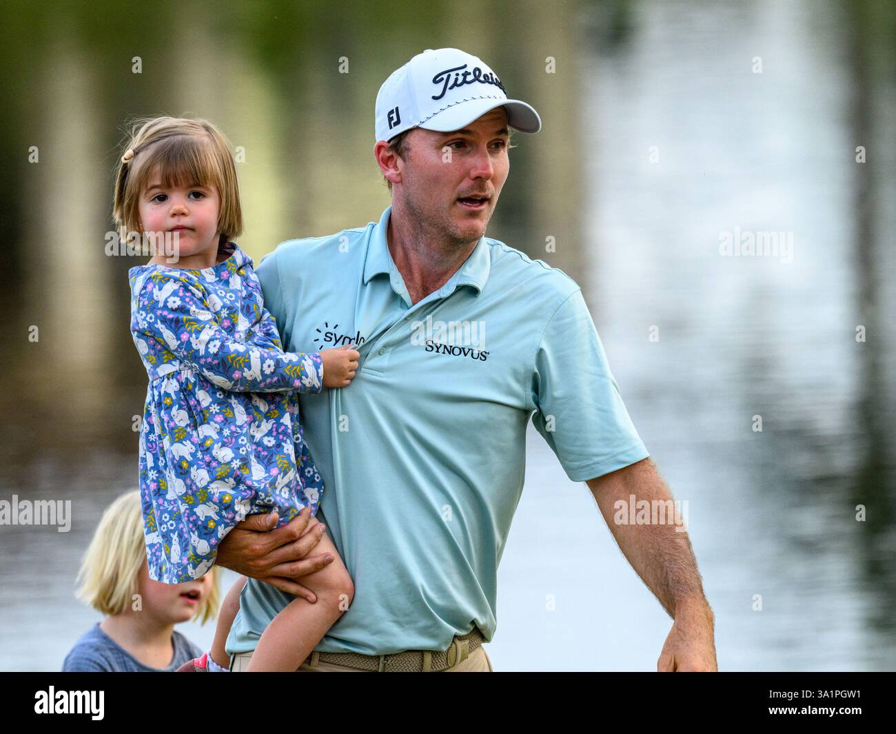 March 9, 2025: Russell Henley is greeted by his daughter Jane Edith on ...
