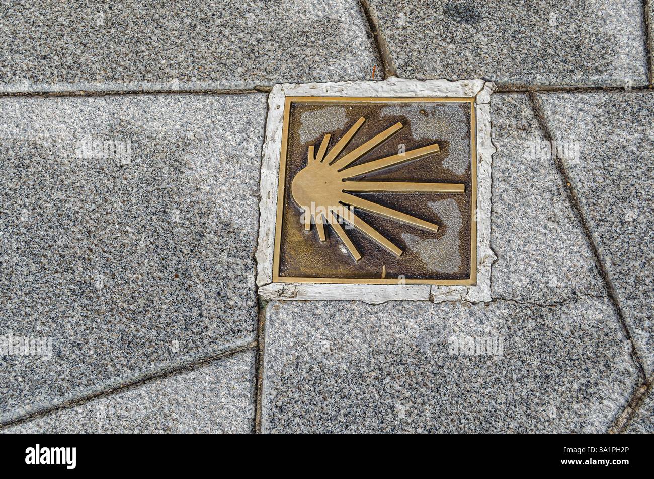Saint James Way symbol on the pavement, indicating the pilgrimage route ...
