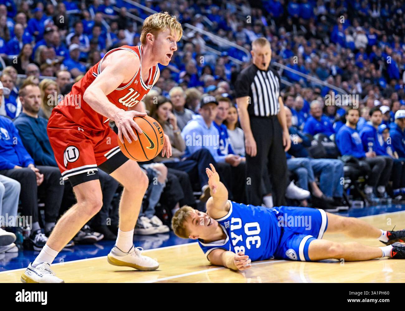 PROVO, UT - MARCH 08: Utah Utes guard Hunter Erickson (0) grabs the ...