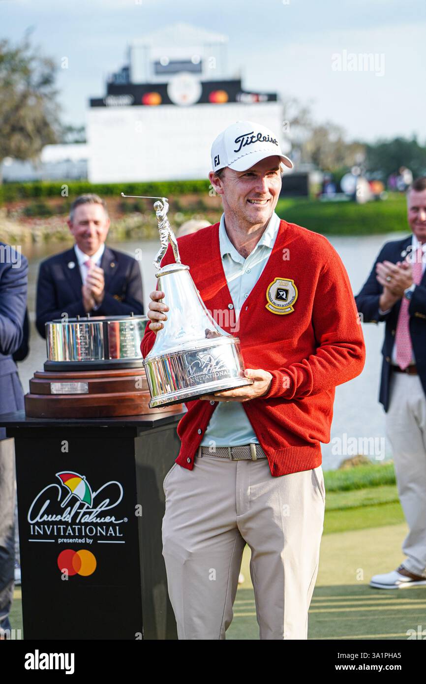 Orlando, Florida, USA, March 9, 2024, Russell Henley holding the trophy ...