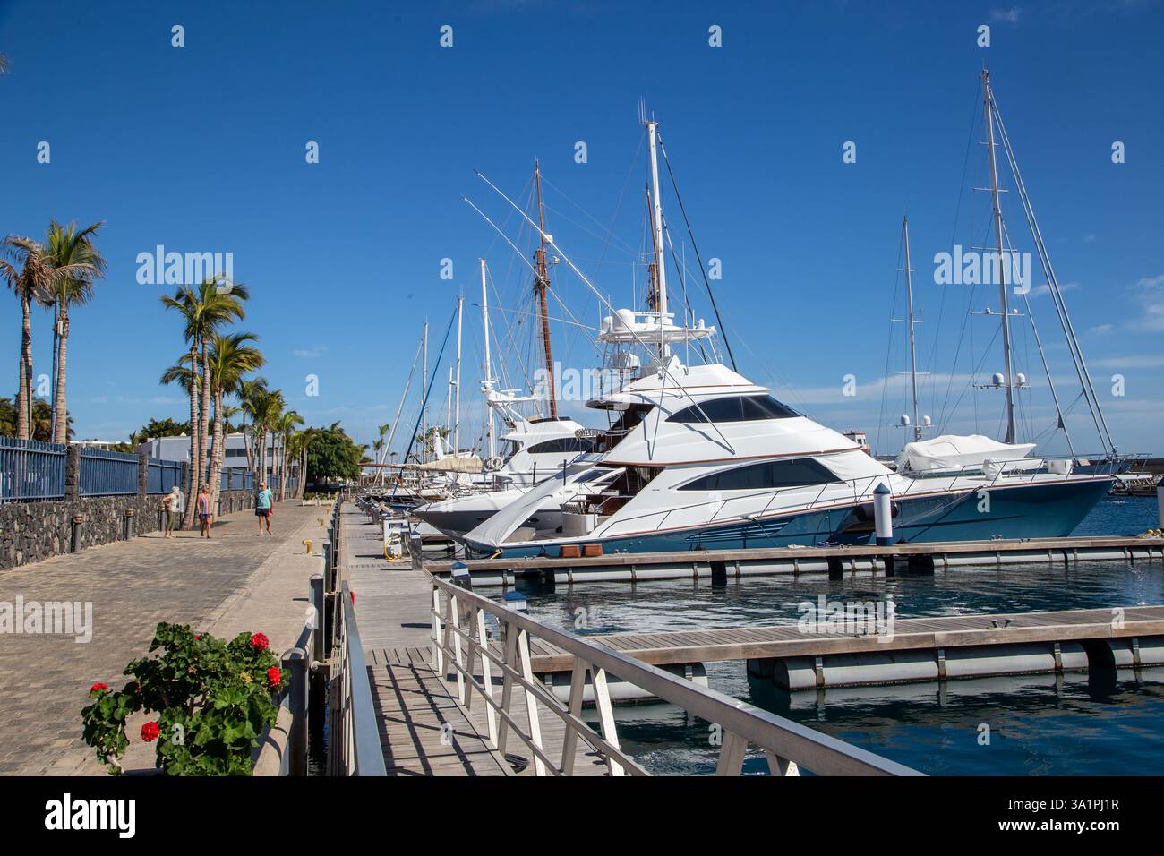 Boats and yachts in the harbour marina at the Spanish Canary resort of ...