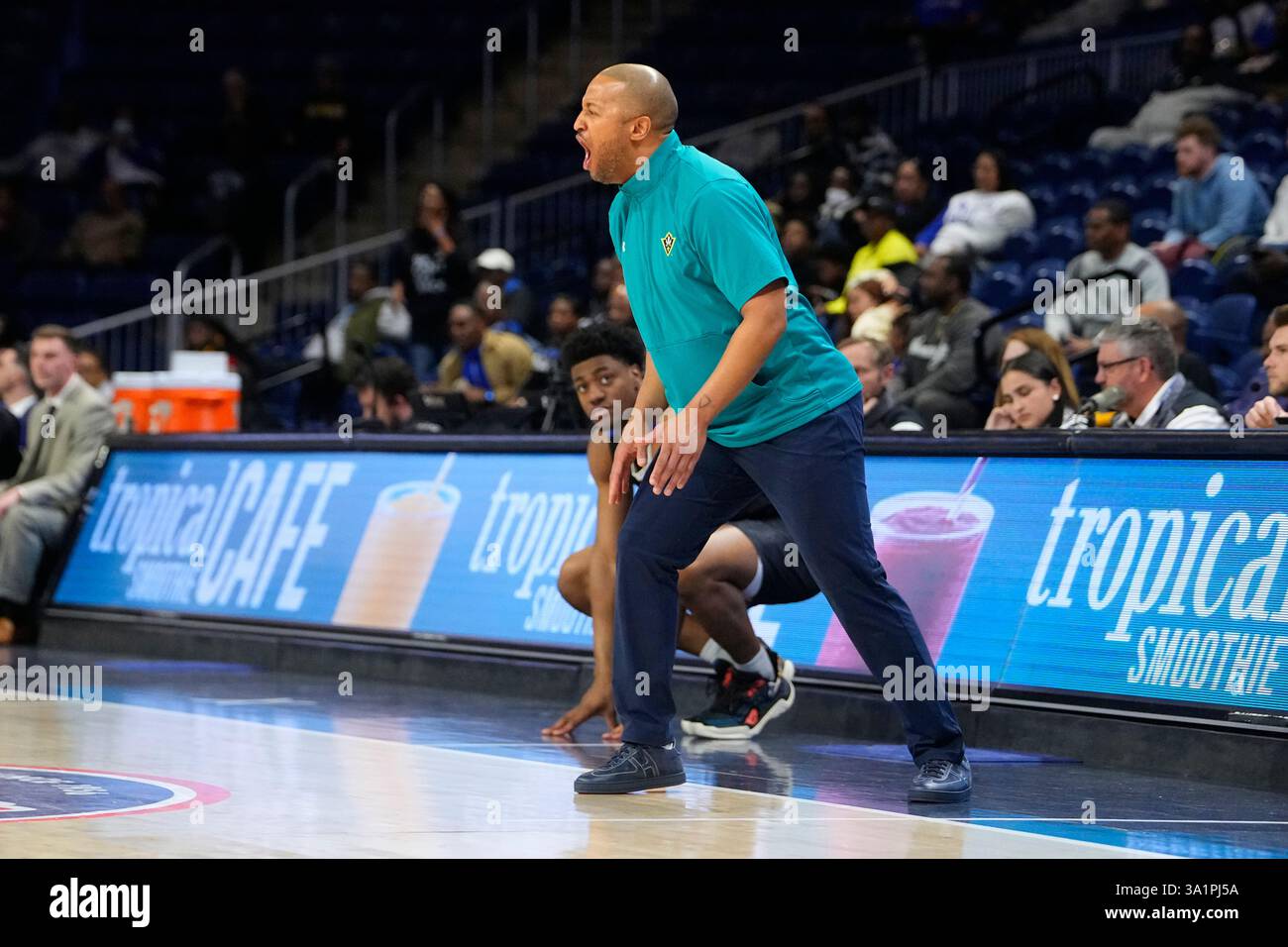 WASHINGTON, DC - MARCH 09: UNC Wilmington Seahawks Head Coach Takayo ...
