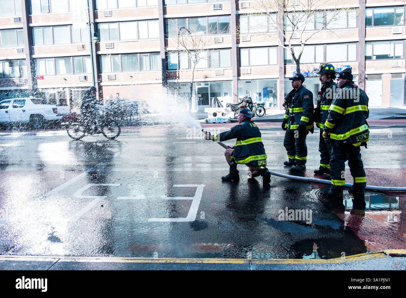 March 9, 2025, New York City, New York, USA: Veteran fireman instructs ...