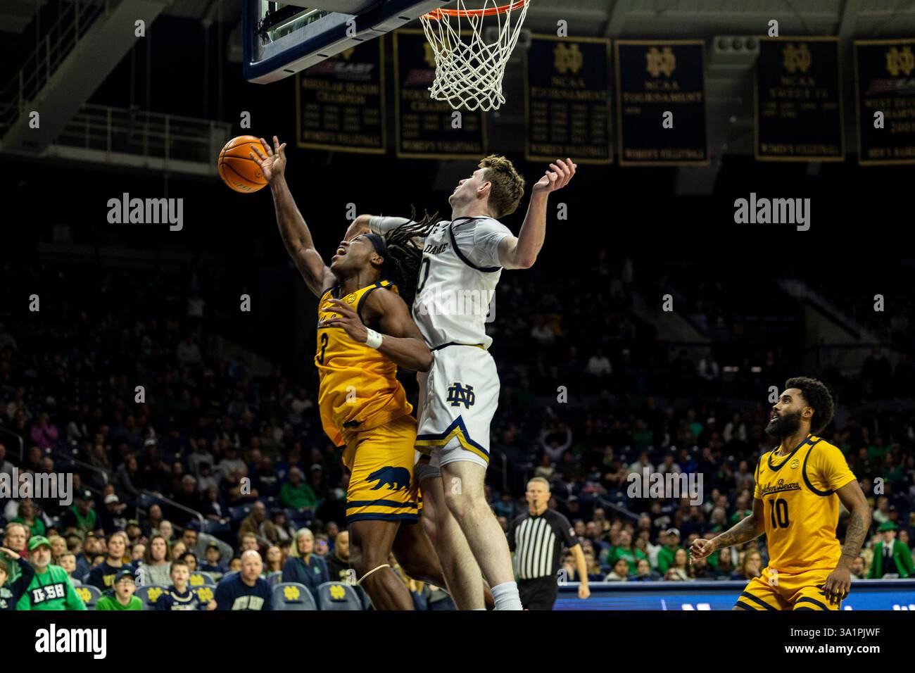 March 08, 2025: Notre Dame guard J.R. Konieczny (20) blocks the shot by ...