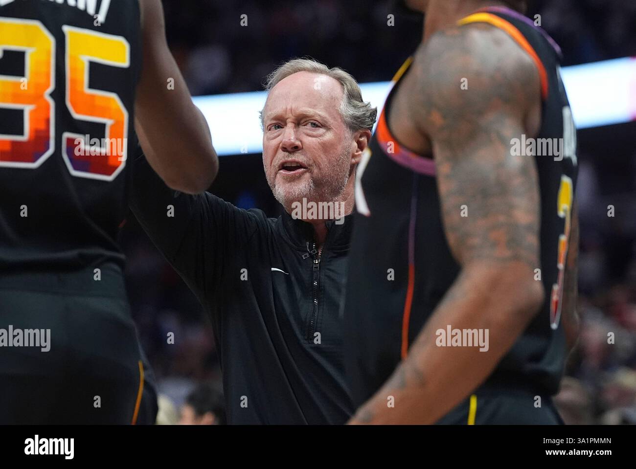 Phoenix Suns head coach Mike Budenholzer () in the first half of an NBA ...