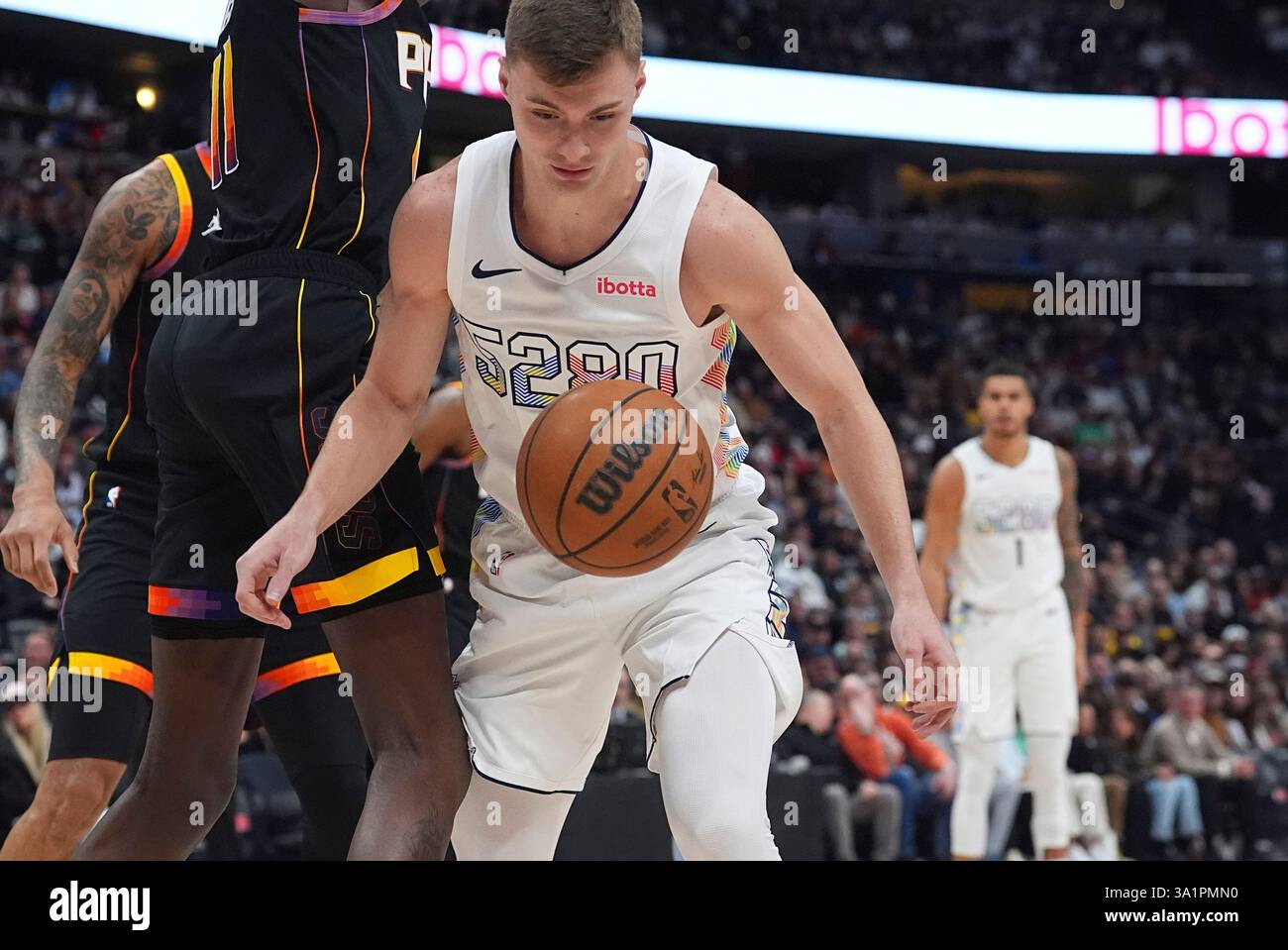 Denver Nuggets guard Christian Braun (0) in the first half of an NBA ...