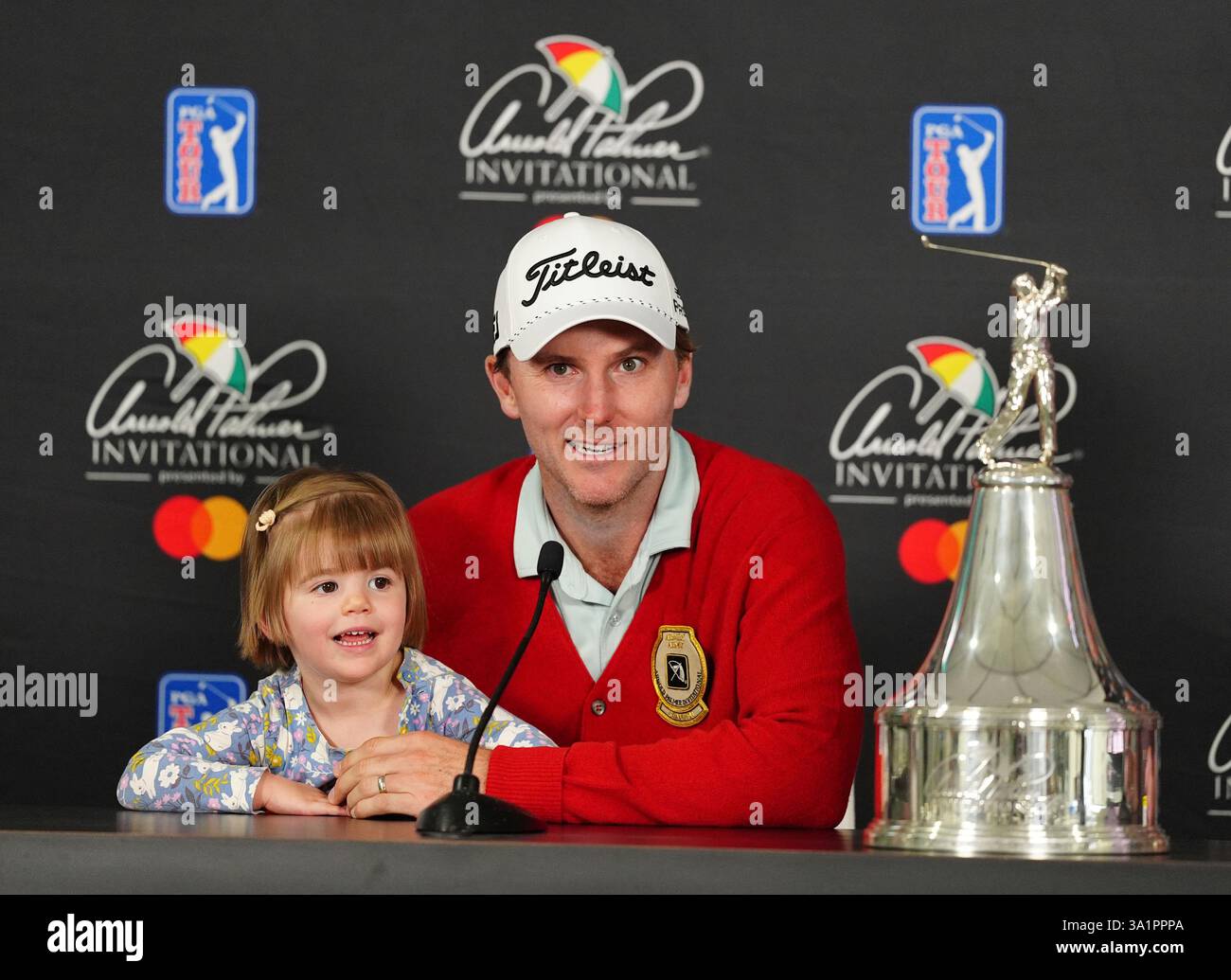 ORLANDO, FL - MARCH 09: PGA golfer Russell Henley holds his two year ...