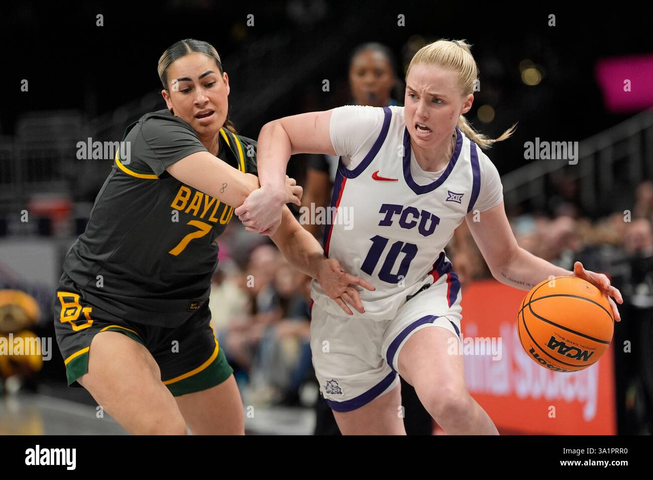 TCU guard Hailey Van Lith (10) drives past Baylor guard Waiata Jennings ...