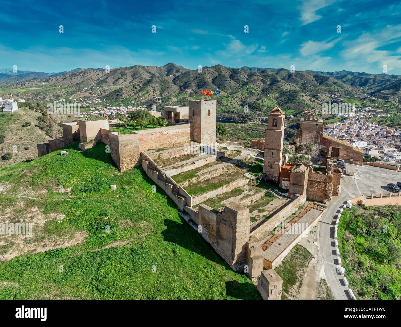 Aerial view of Alora medieval hilltop castle ruin with dual walled ...