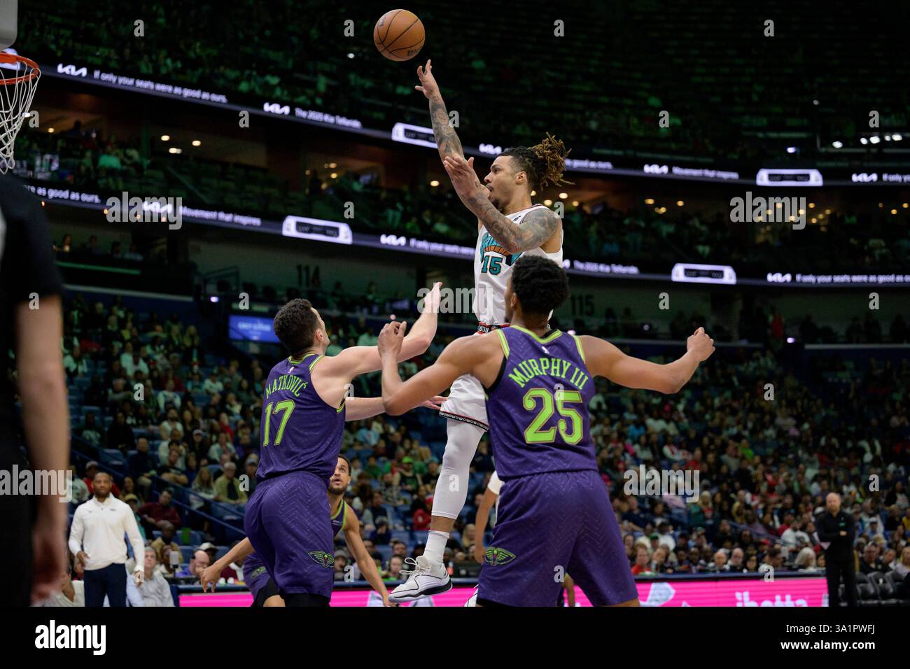 Memphis Grizzlies forward Brandon Clarke (15) shoots against New Orleans Pelicans center Karlo ...