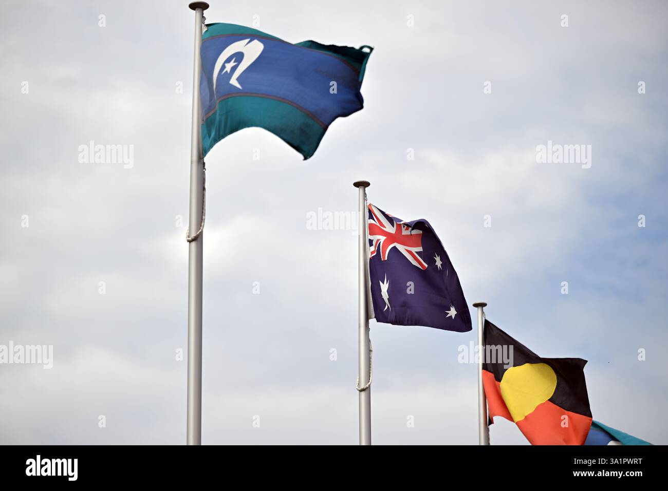 Canberra, Australia. 10th Mar, 2025. The Torres Straits flag, the Australian flag and the ...