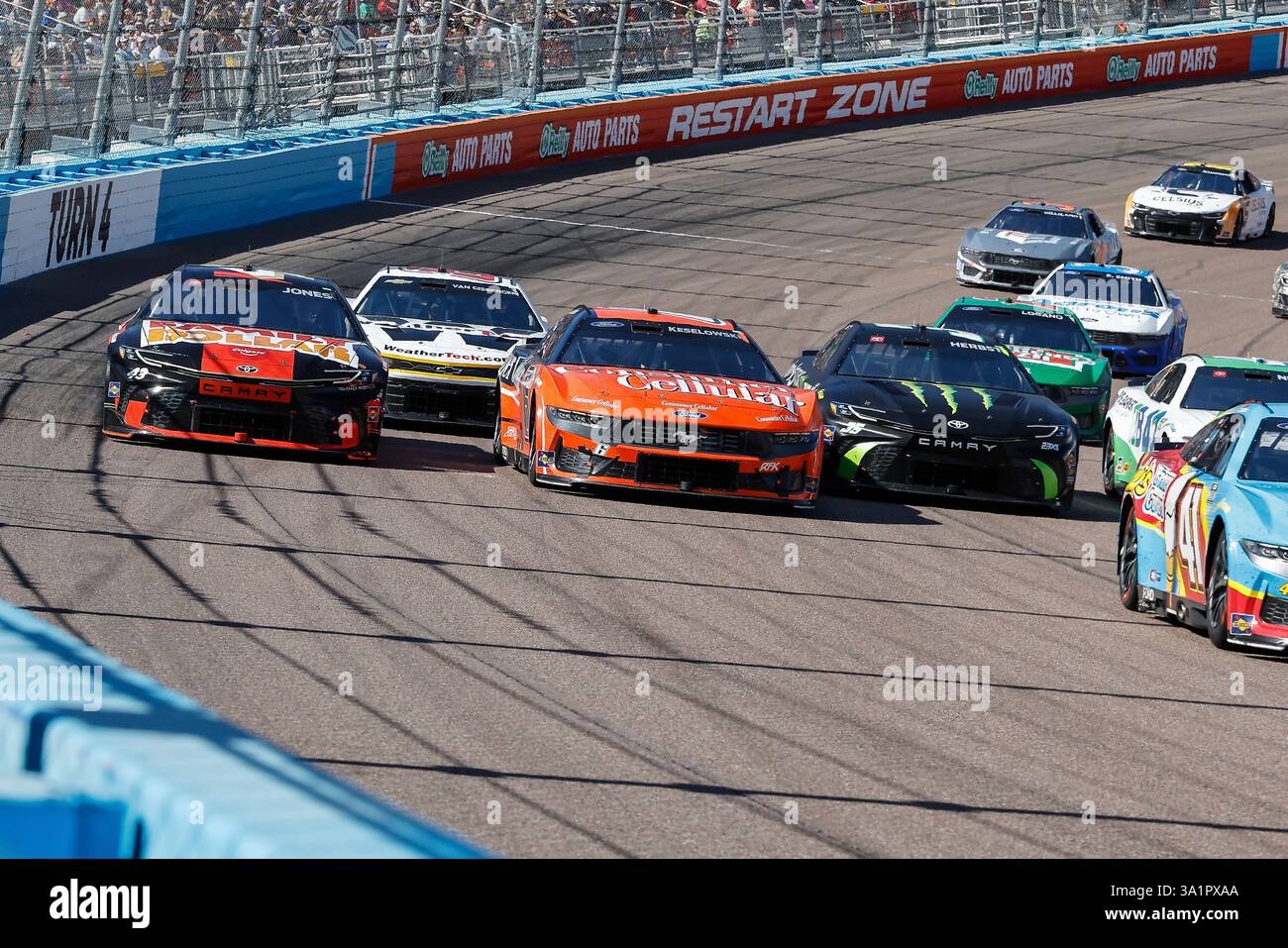 AVONDALE, AZ - MARCH 09: A group races during the NASCAR Cup Series ...