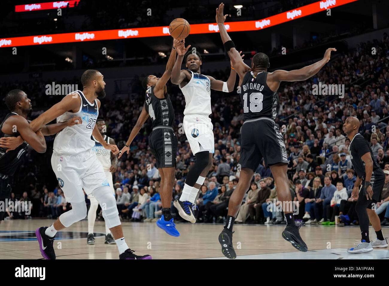 Minnesota Timberwolves guard Anthony Edwards (5) passes over San ...