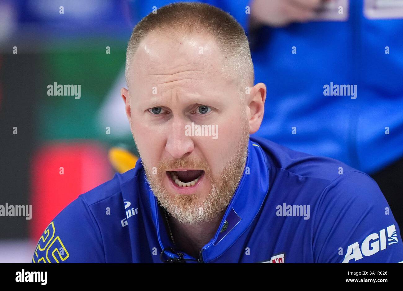 Alberta-Jacobs skip Brad Jacobs calls to the sweepers while playing ...