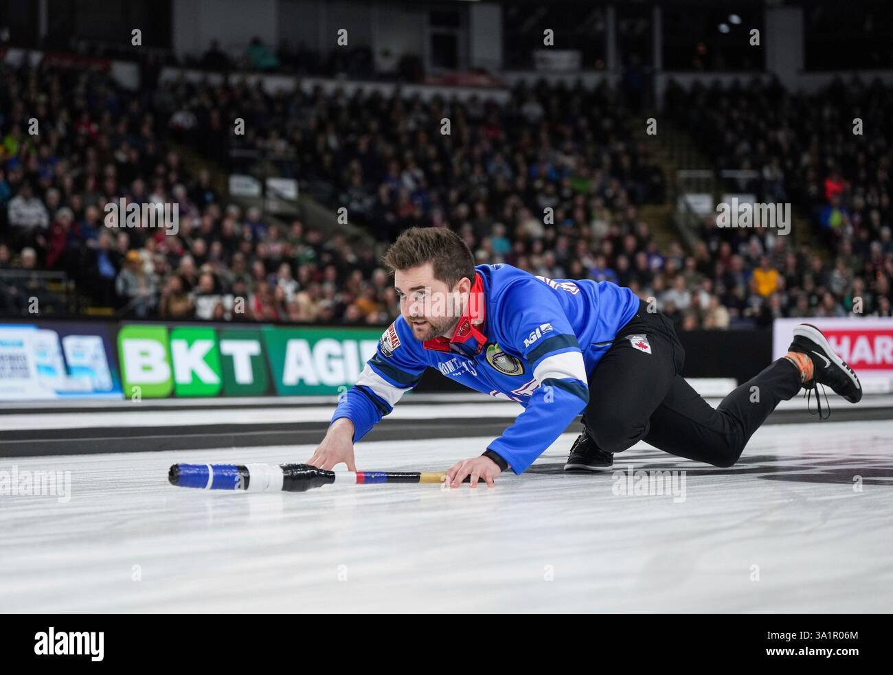 Manitoba-Dunstone skip Matt Dunstone watches his shot while playing ...
