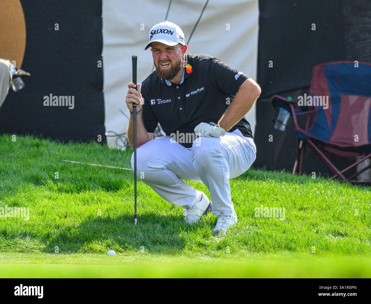 March 9, 2025: Shane Lowry of Ireland looks over his shot from the back ...
