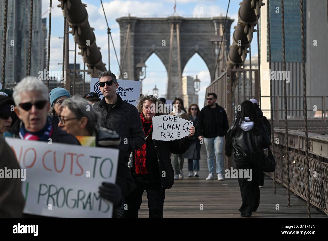 New York, USA. 09th Mar, 2025. People take part in a civil rights march ...