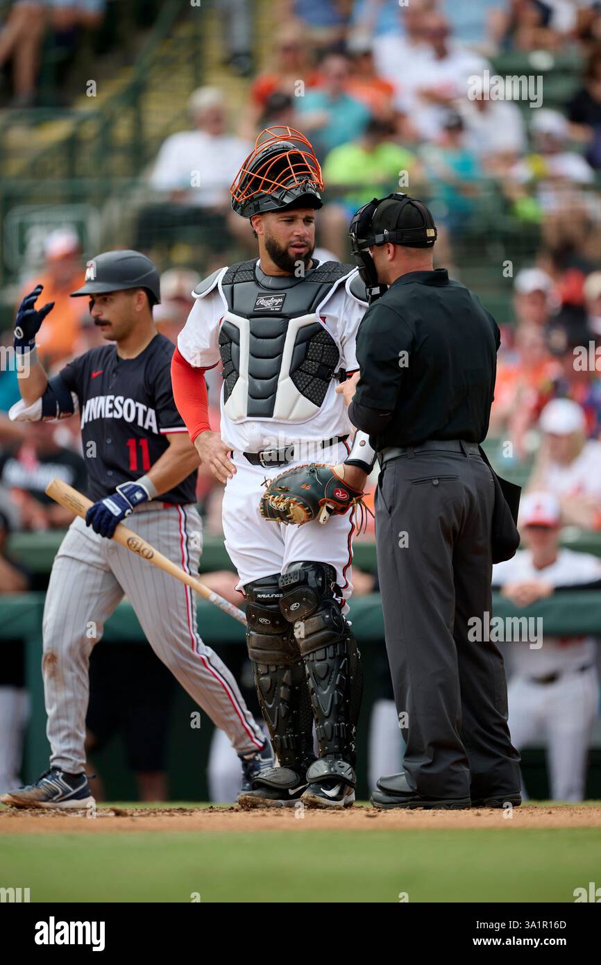 Baltimore Orioles catcher Gary Sanchez (99) talks with umpire Ben May ...
