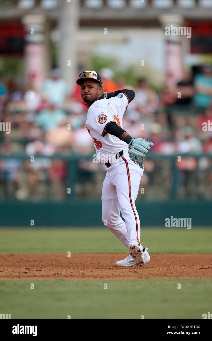 Baltimore Orioles shortstop Leandro Arias (86) throws to first base ...
